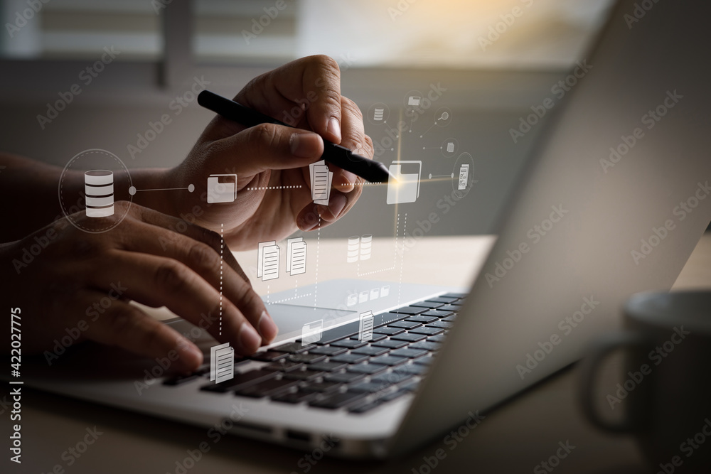 IT working on computer Business processes Document Management System ...