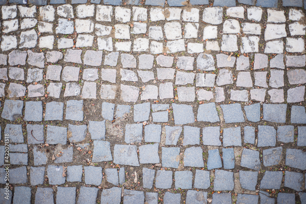 stone pavement texture, Old square stone tiles on the road and sidewalk ...