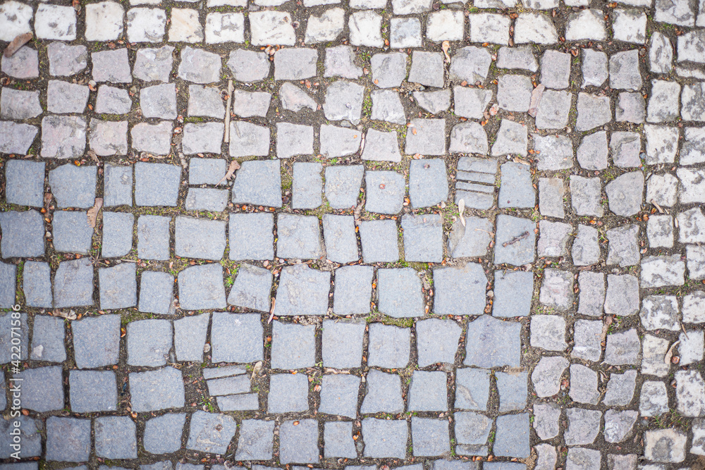 stone pavement texture, Old square stone tiles on the road and sidewalk ...