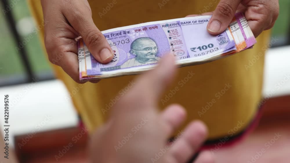 Counting Indian currency Rupee , hand paying salary giving Indian money ...
