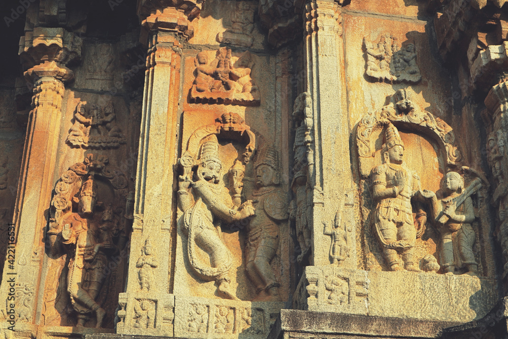 Avatars of Lord Vishnu on the wall of a Hindu temple in Sringeri. Stone ...