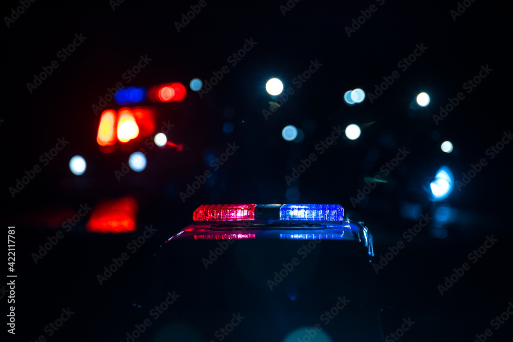 Police cars at night. Police car chasing a car at night with fog ...