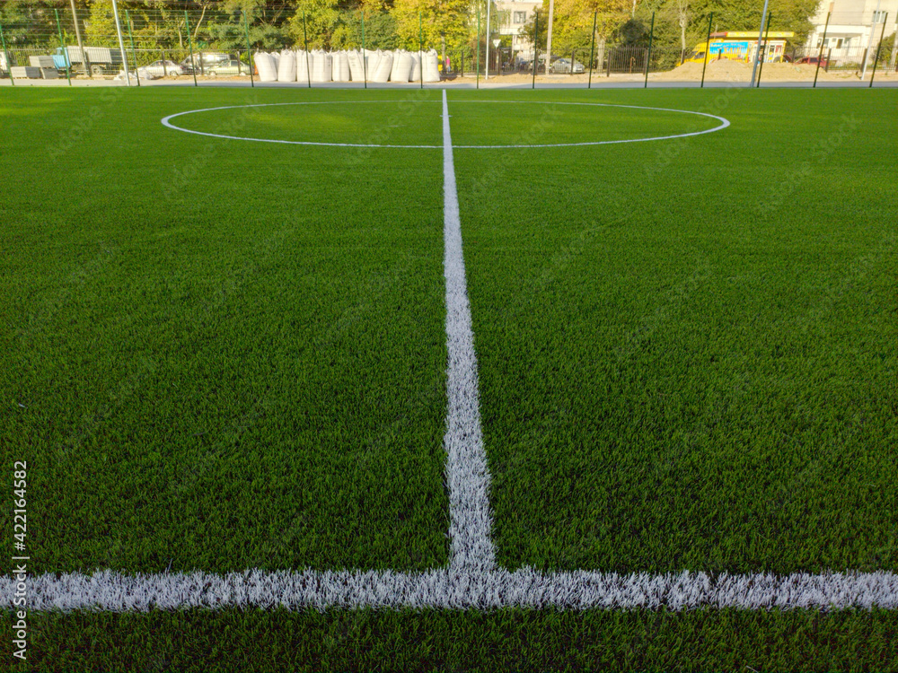 Artificial grass soccer field. Corner kick line of ball and a soccer ...