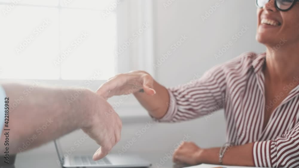 Smiling caucasian female hr manager handshake hire male candidate at ...