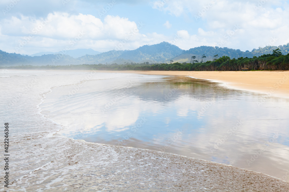 Red island beach ( pantai Pulau merah ) in Banyuwangi in Indonesia. Sky ...