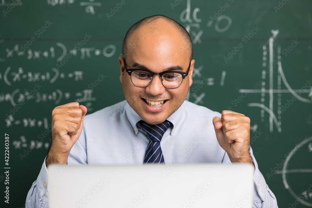Indian young teacher man sitting teaching online video conference live ...