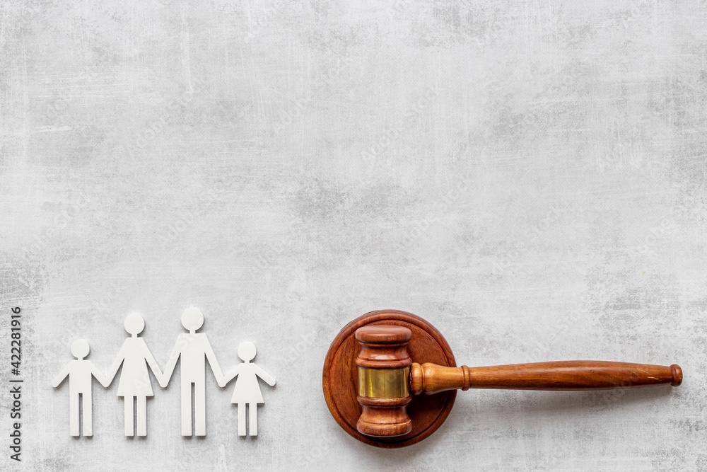 Family law or divorce concept. Family figure with judge gavel, top view ...