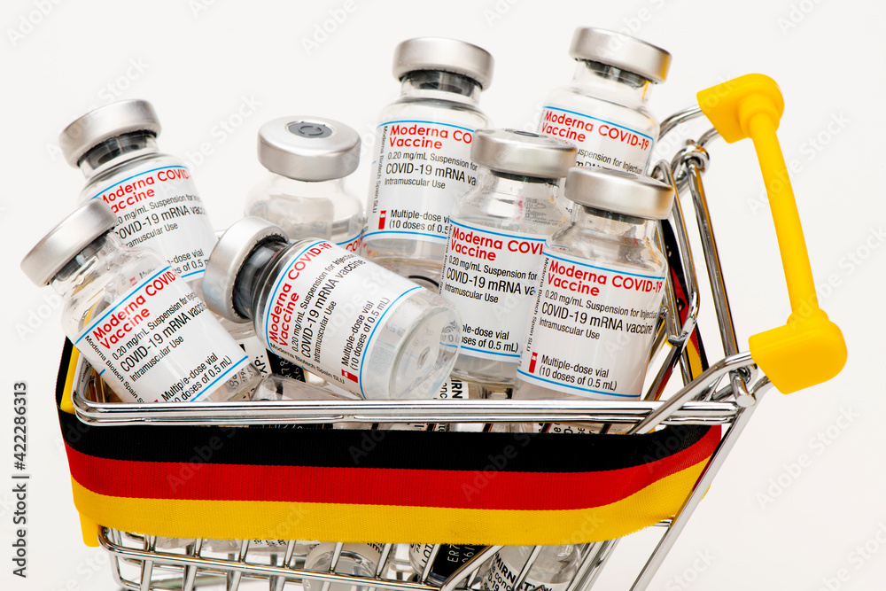 Vials with the Moderna and Pfizer-Biontech Covid-19 vaccine are laying ...