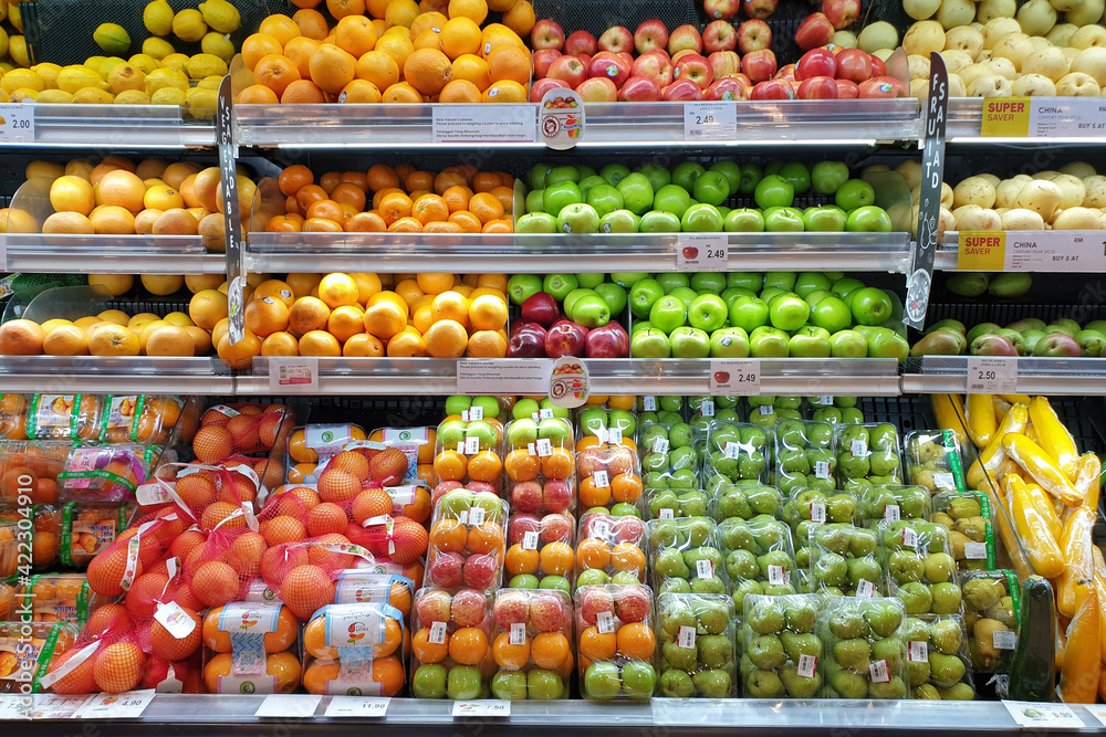 Interior view of the huge refrigerator with various fresh fruits and ...