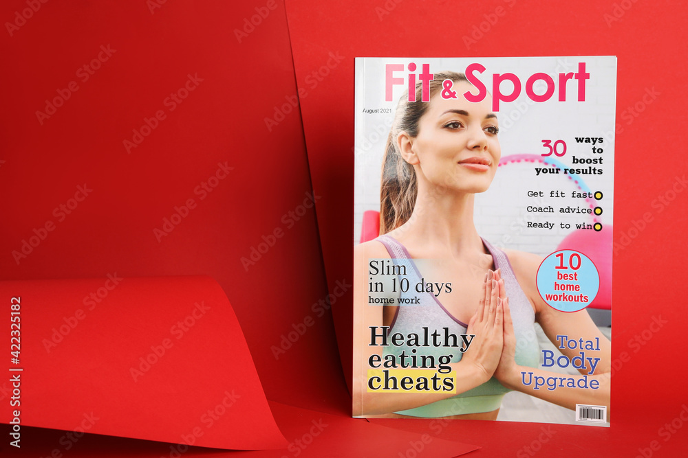 Modern printed sports magazine on red background, space for text Stock ...