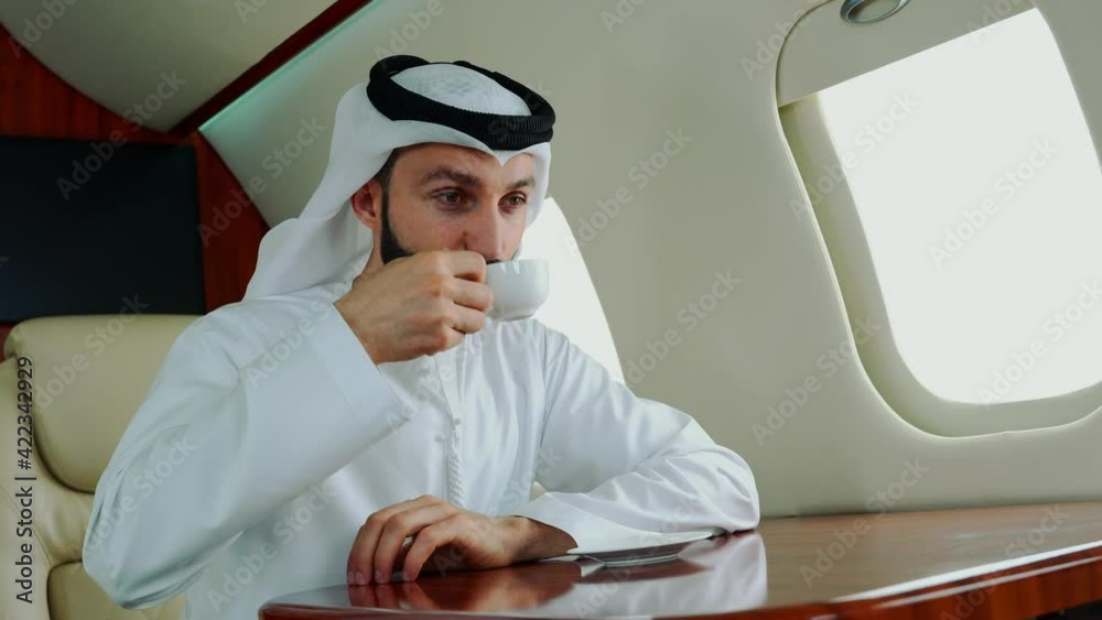 Arabian man flying on his Private jet to dubai. Video concept about ...