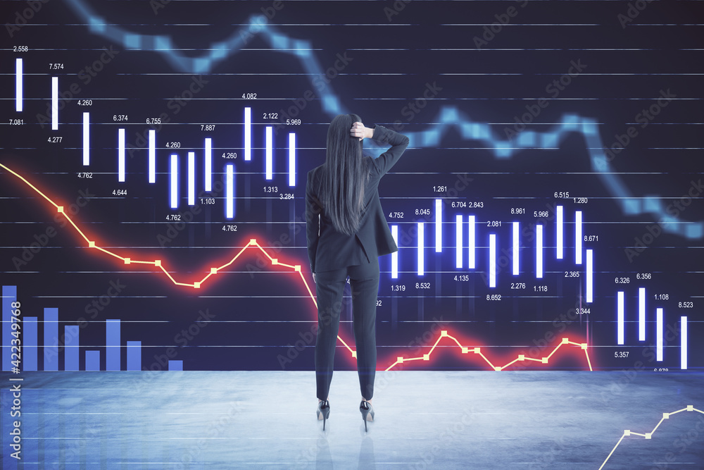 Loss of profit concept businesswoman grabs her head and looking on big ...