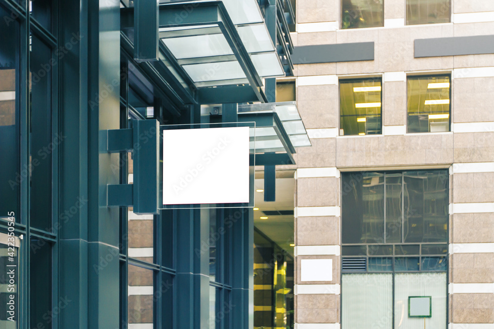 White square sign with blank space for your logo on the wall of a ...