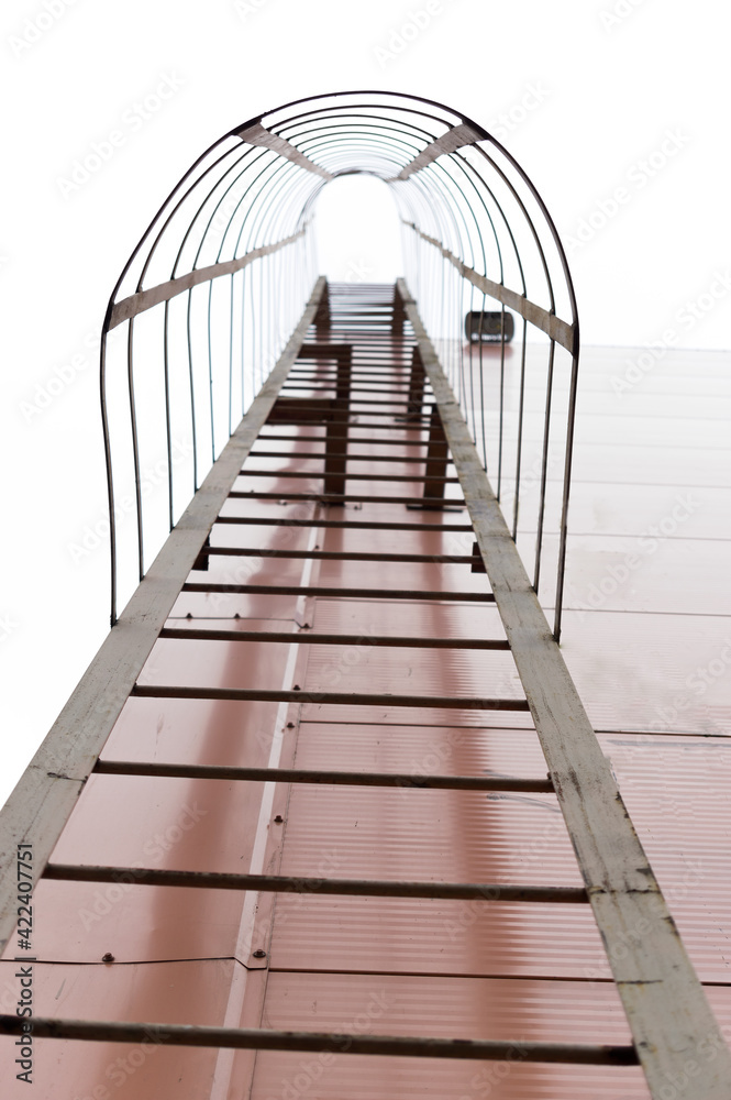 Fire escape with a tunnel. Roof ladder with tunnel. Safety ladder ...
