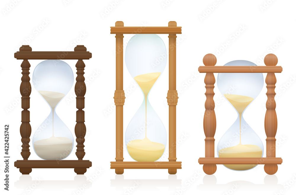 Hourglasses. Three wooden sand timer, time glasses or egg timer ...