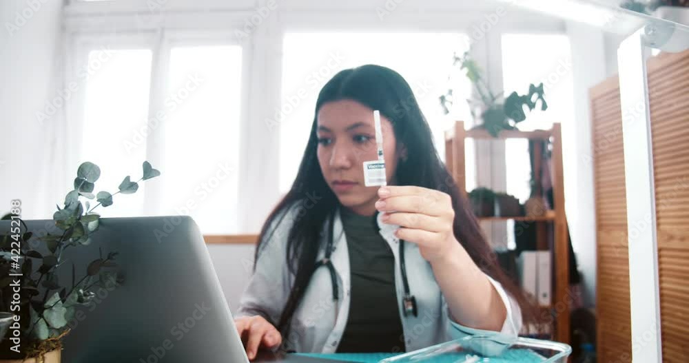 Vaccine trial inspection. Zoom in on professional multiethnic ...