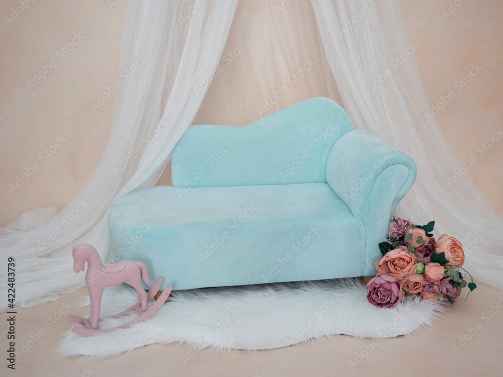 Couch for a baby photo session in a photo studio Stock Photo | Adobe Stock