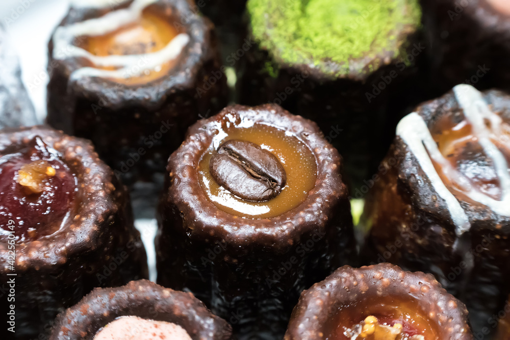 Caneles de bordeaux is a small pastry with rum and vanilla, traditional ...