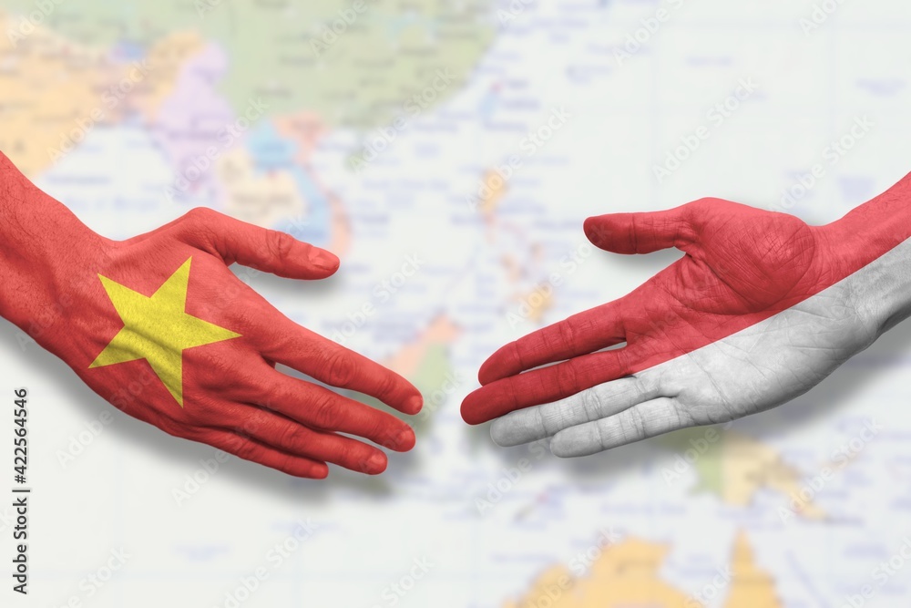 Vietnam and Indonesia - Flag handshake symbolizing partnership and ...