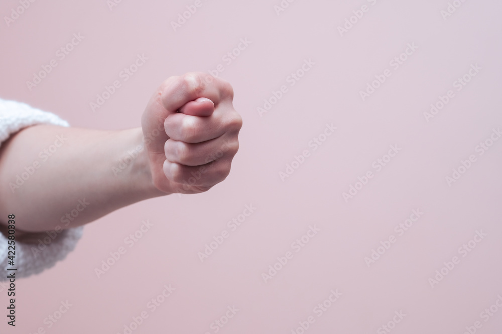 Hand gesture of refusal or fig sign. Closeup, copy space. Hand signs ...