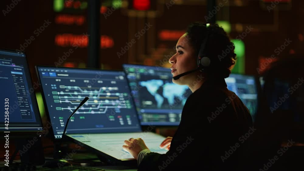 Multiethnic Female IT Technical Support Specialist Talking with a ...