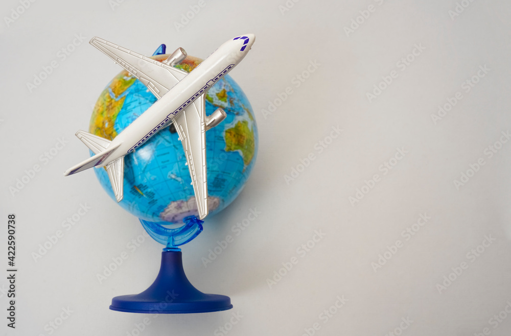 plane on the globe map - round the world air travel Stock Photo | Adobe ...