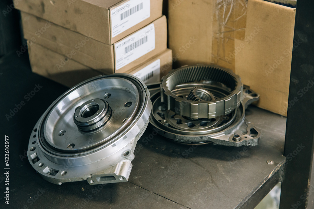 Set of various engine and gearbox spare parts. Shiny gears for ...