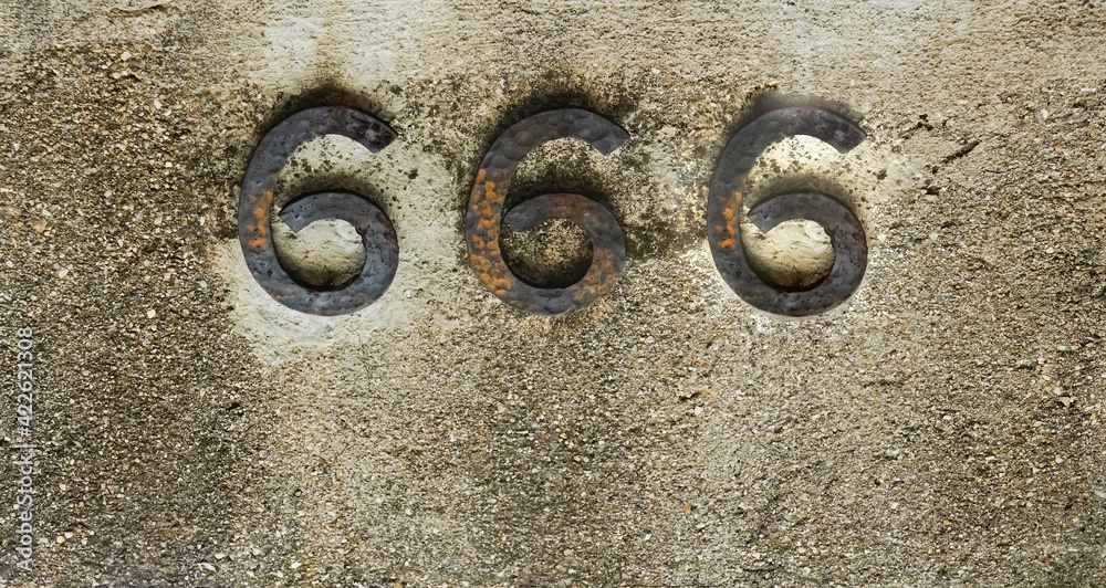 Engraved number 666 on stone background. iron digits, numbers - three ...