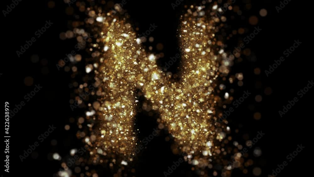 Gold glitter letter N fly into camera. Golden glitter alphabet symbol ...