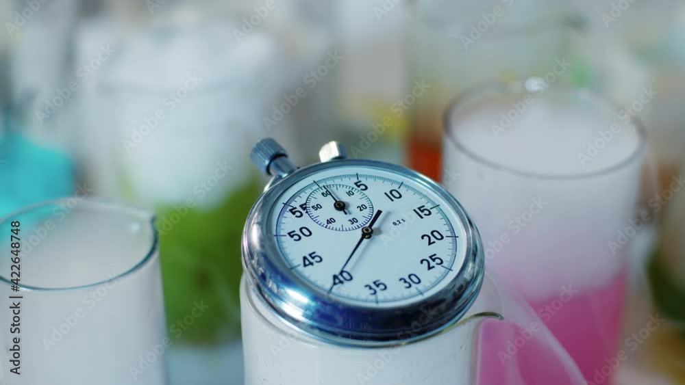 Taking video closeup of a stopwatch using for experiment in the ...