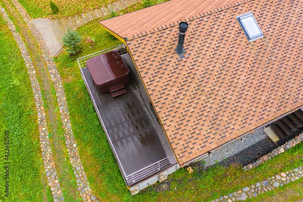 Private house and its territory top view. Roof of cottage and its ...