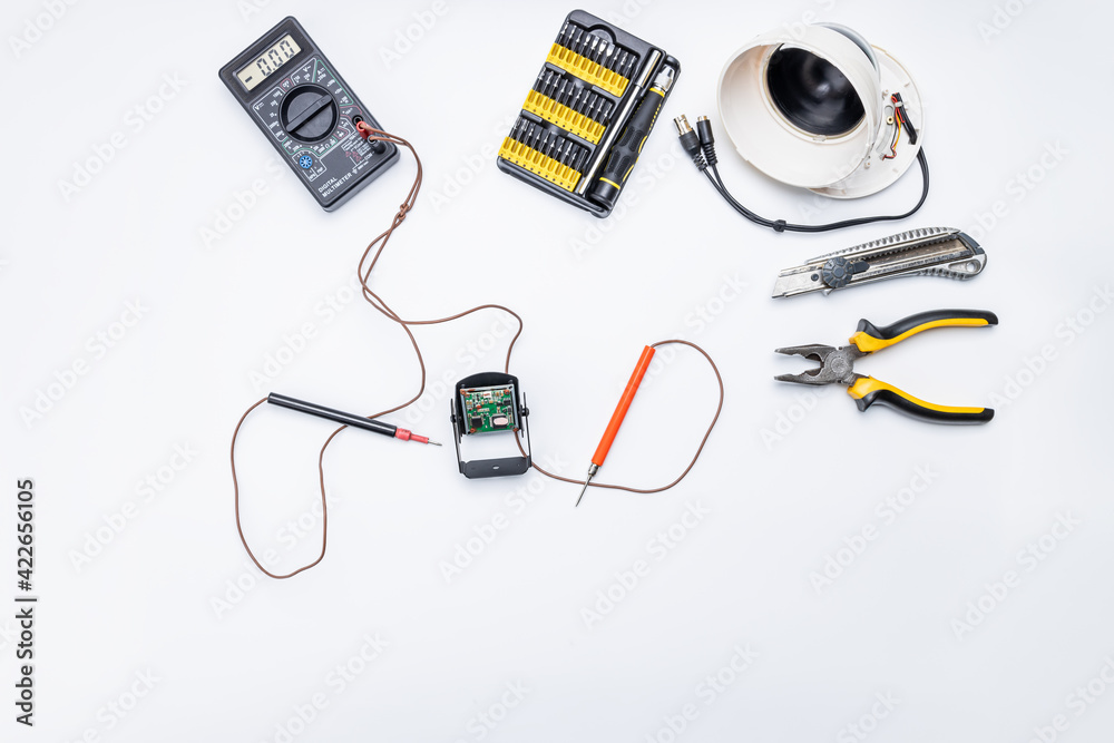 cctv camera service repair concept. above view. adjusting surveillance ...