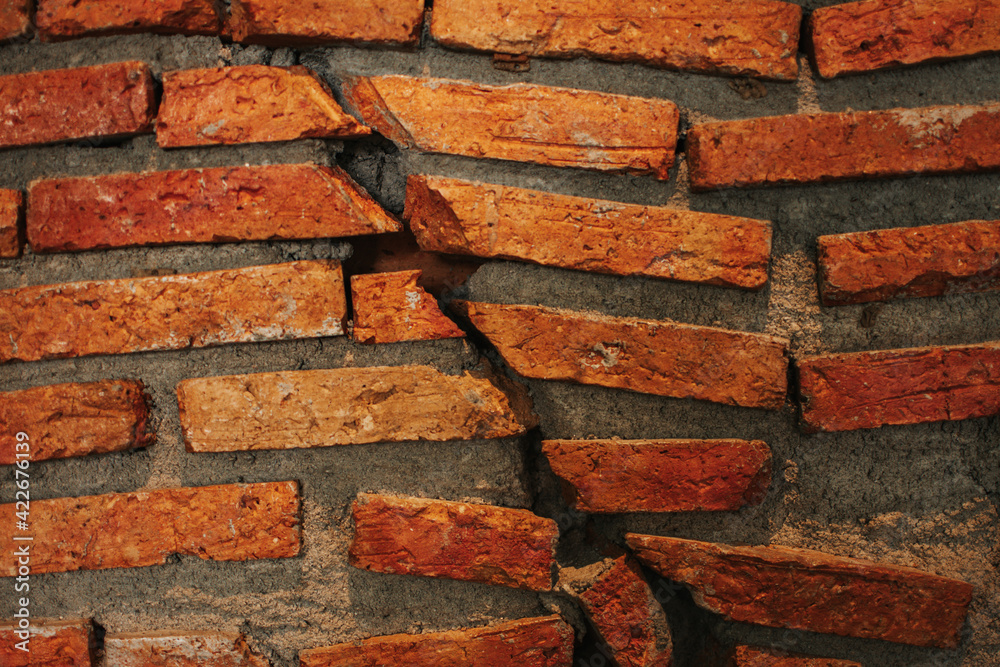 Cracked brick wall, Cracked brick wall background. Red brick wall ...
