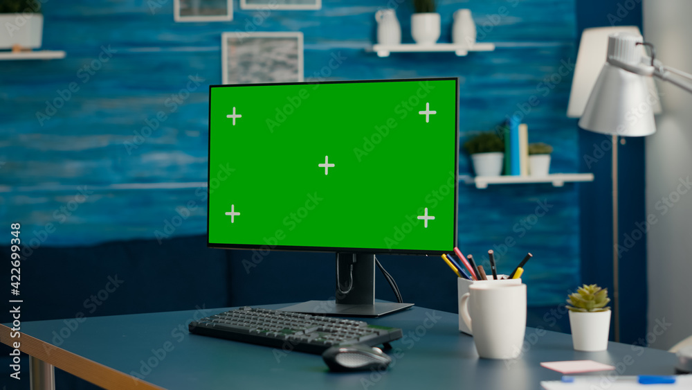 Close up of professional powerful computer with mock up green screen ...
