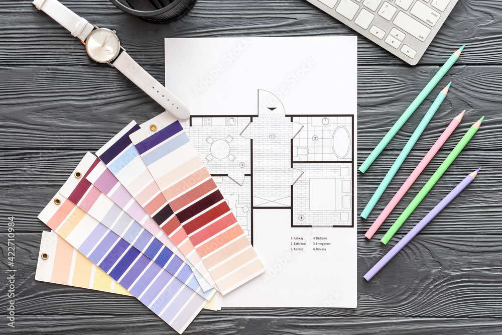 House plan and color palettes on wooden background Stock Photo | Adobe ...