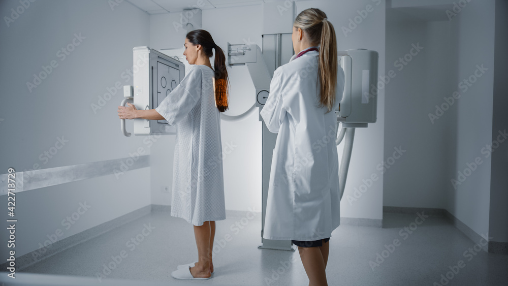 Hospital Radiology Room: Beautiful Multiethnic Woman in Medical Gown ...