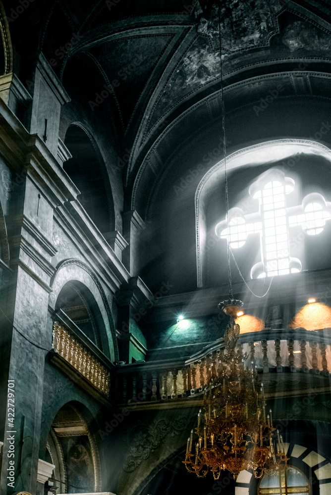 Ceiling сhurch architecture. Painting icons. Baroque style. Light from ...