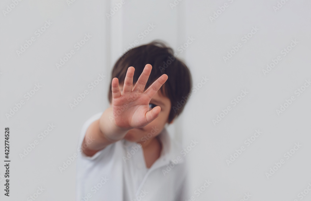 Blurry face of boy showing hand defended himself in retro tone,kid boy ...