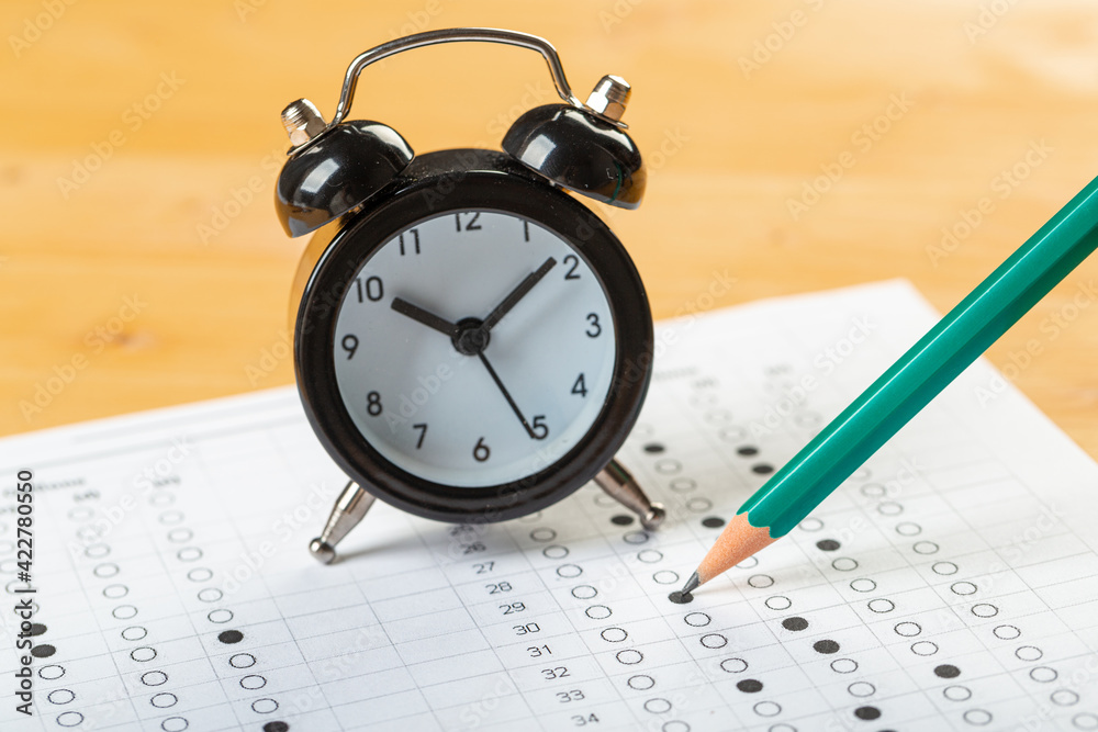 alarm clock, optical form of standardized school test with bubble and ...