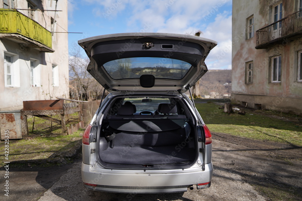 Empty car in the village, sunny day, going to the country side. the car ...