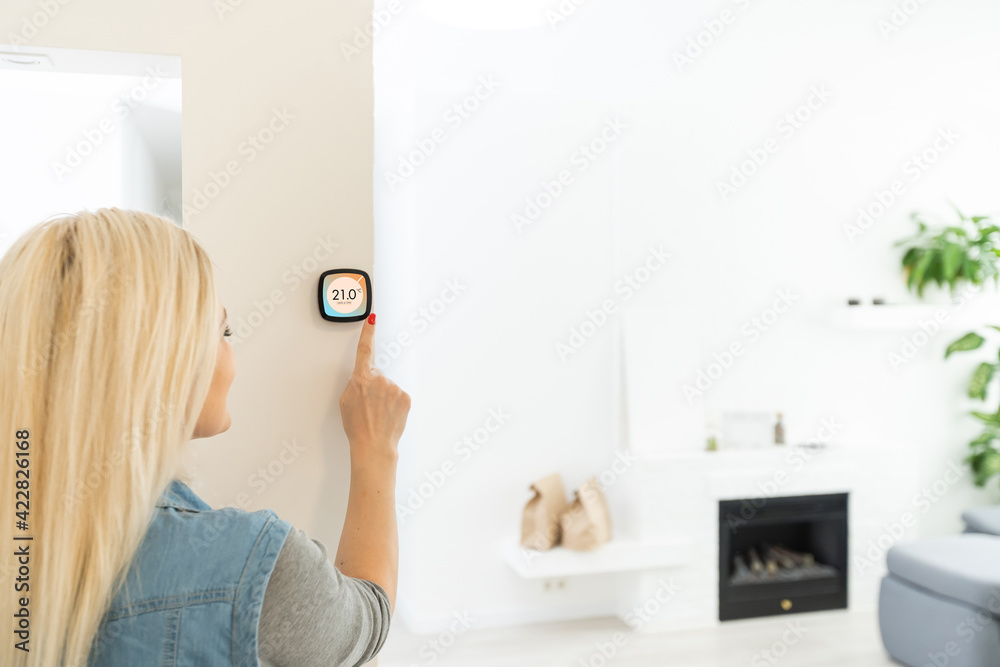 Thermostat smart home domotic control panel on wall for winter house ...