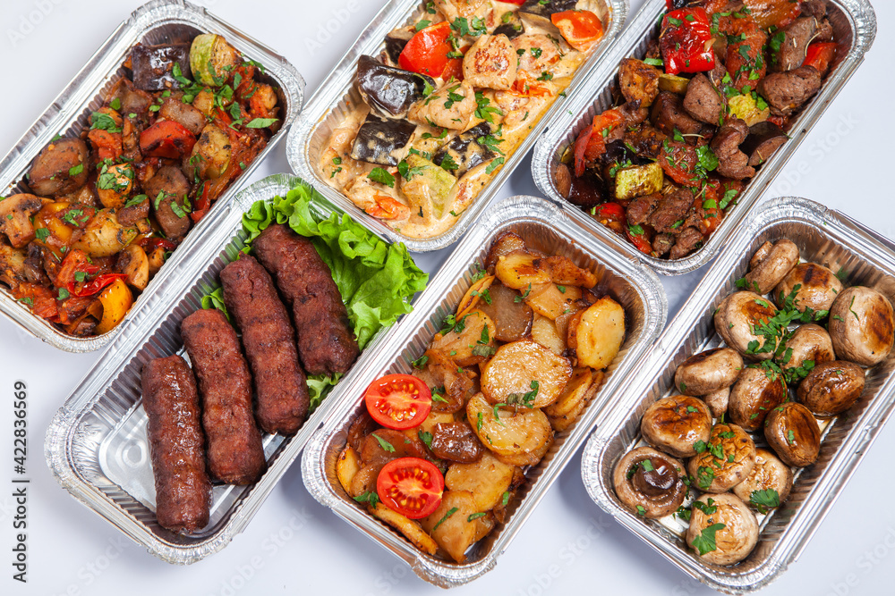 Business lunch in eco plastic container ready for delivery.Top view ...
