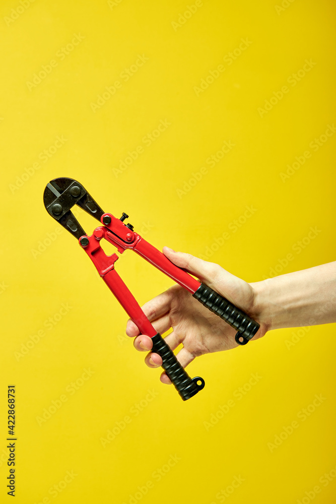 bolt cutter tool in male hands used for cutting bolts, chains, padlocks ...