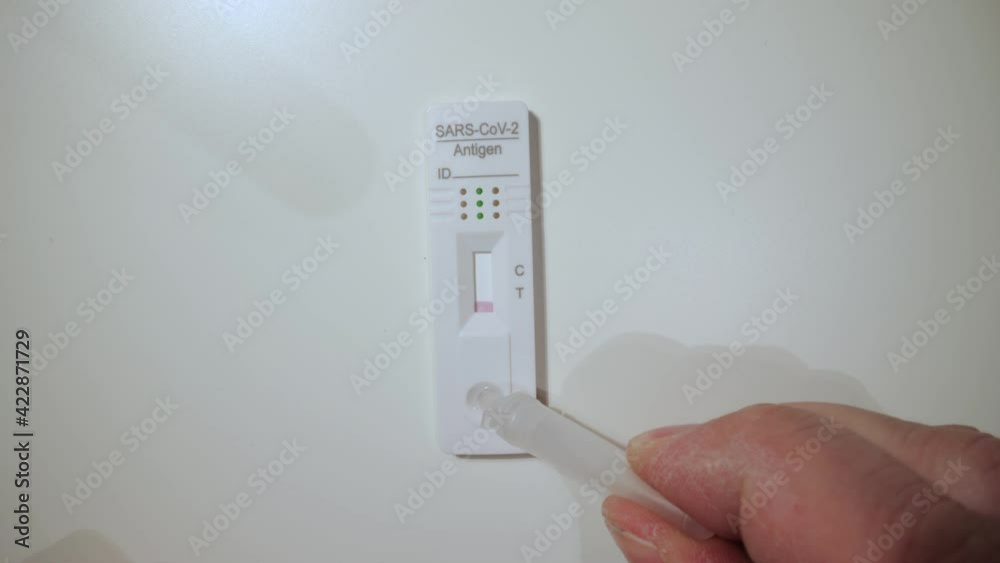 Applying a Corona Rapid Test - Covid-19 Antigen Test - Sars COV 2 ...