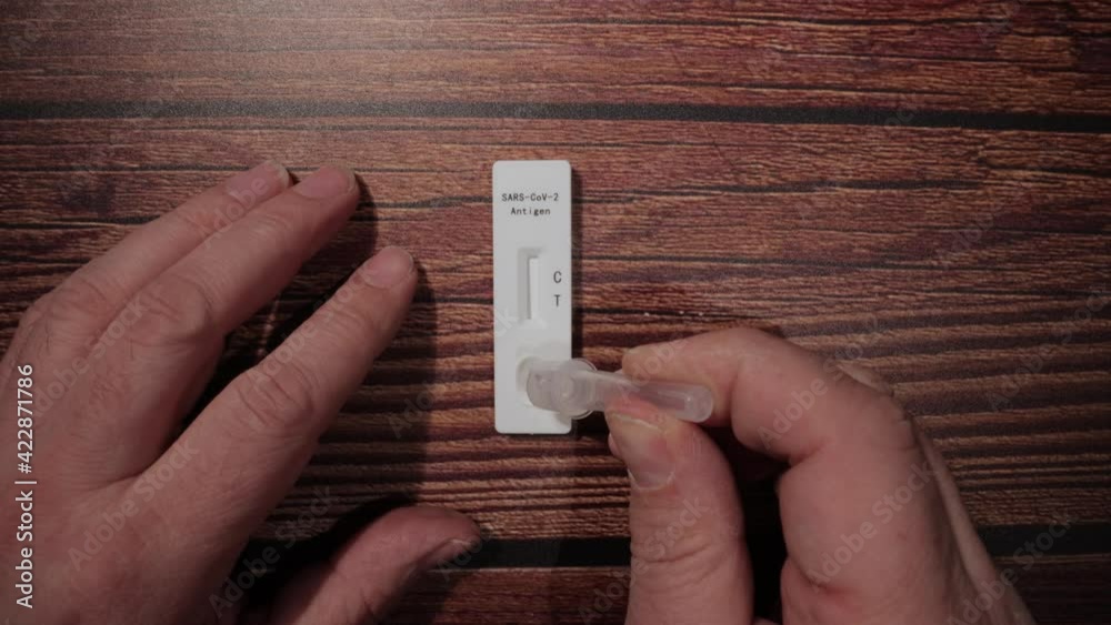 Applying a Corona Rapid Test - Covid-19 Antigen Test - Sars COV 2 ...