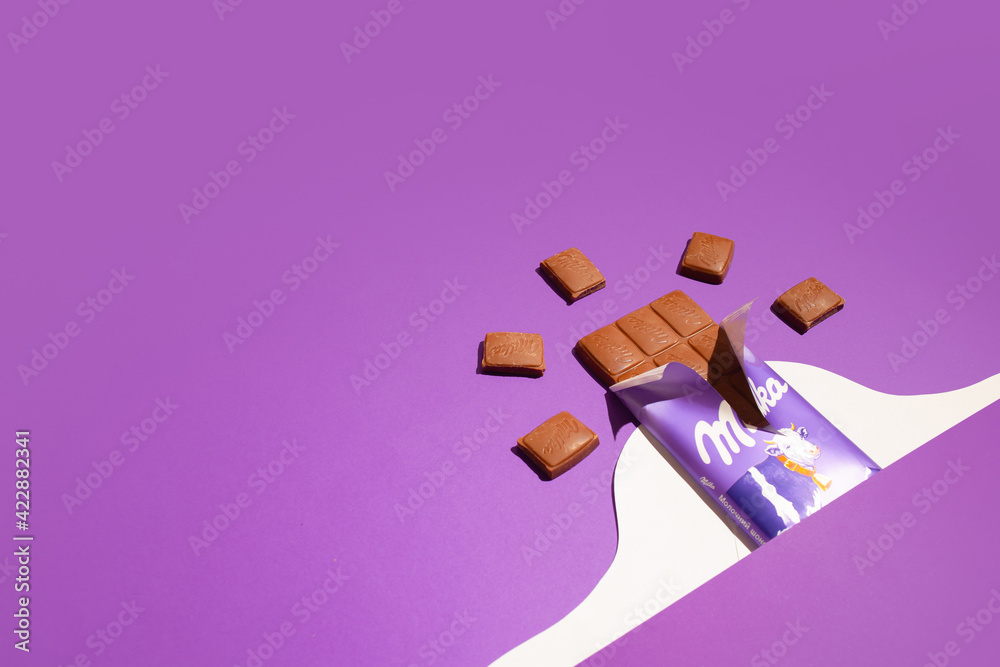 Kiev, Ukraine - April 4, 2021: Milka chocolate in an open package and ...