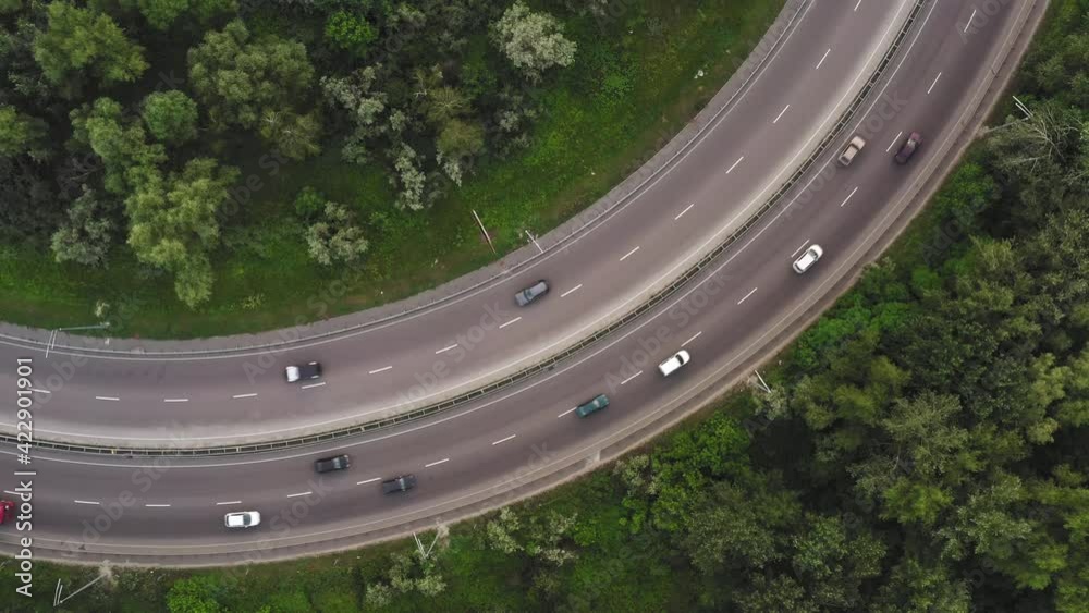 Video Stock Smooth traffic at the turn of the two-lane highway ...