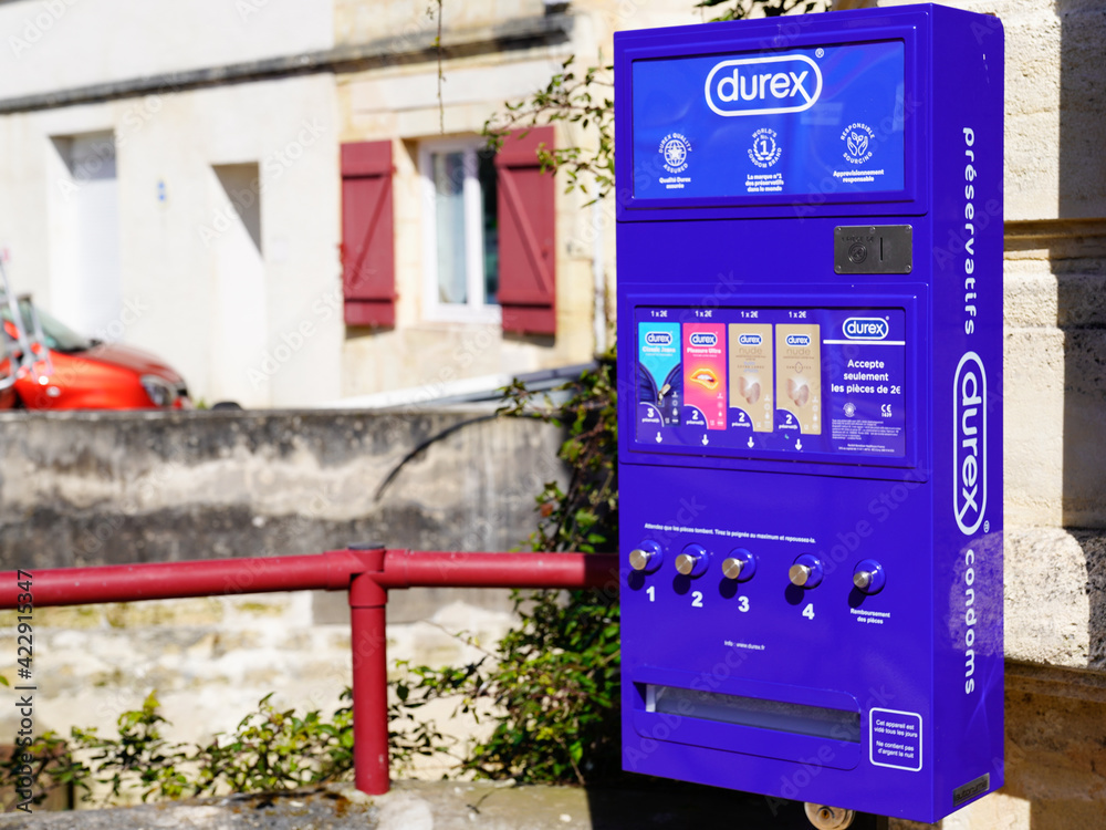 durex logo brand and sign text on city condoms automat on street wall ...