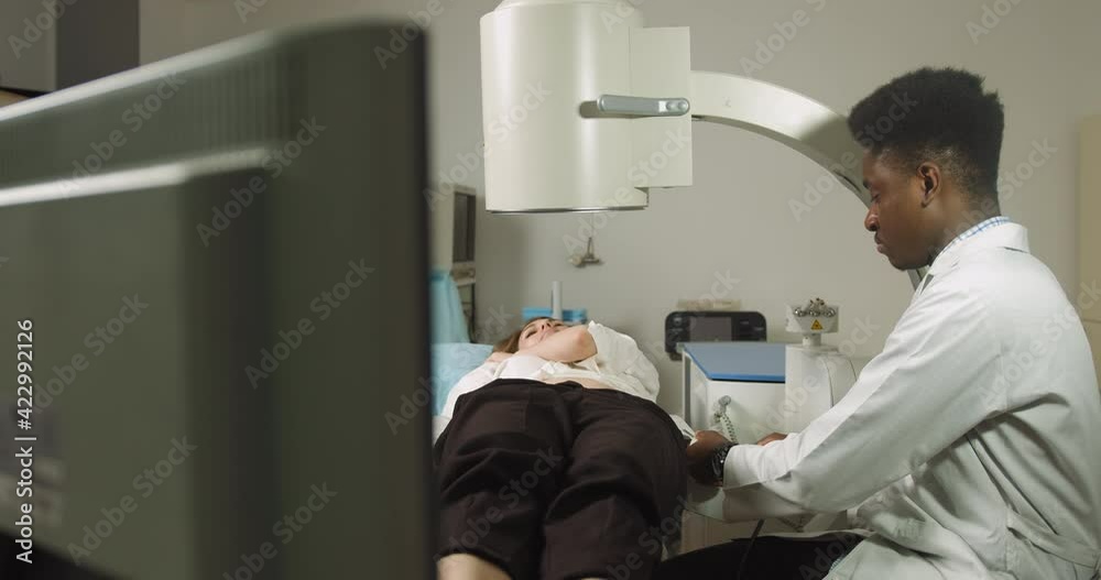 Extracorporeal shock wave therapy. Kidney stone treatment. Front view ...