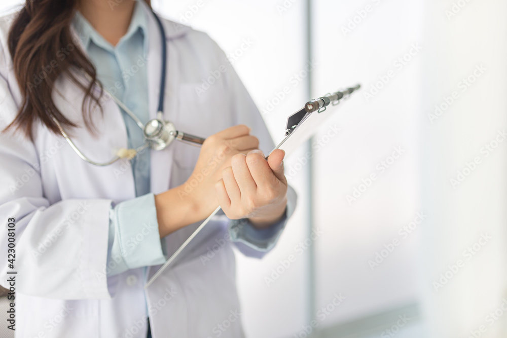 close up hand holding chart, female doctor order medicine on patient ...